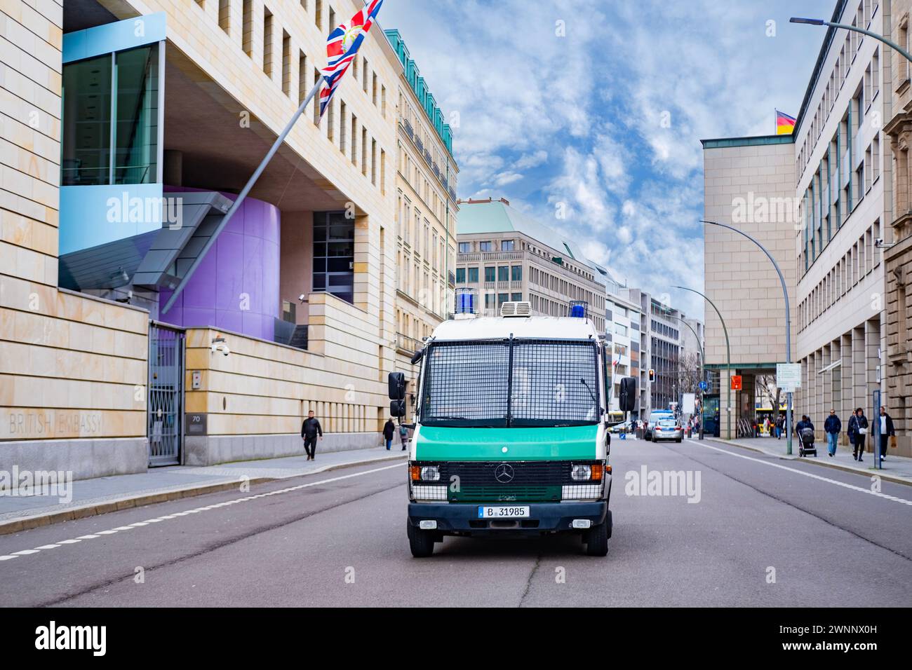 white and green police bus parked on street in Berlin near British ...