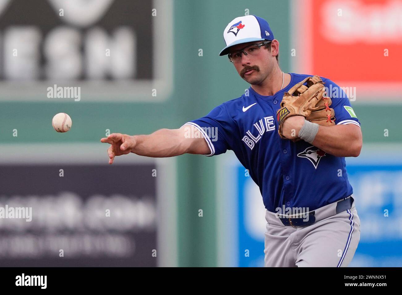 Toronto Blue Jays second baseman Davis Schneider throws out Boston Red ...