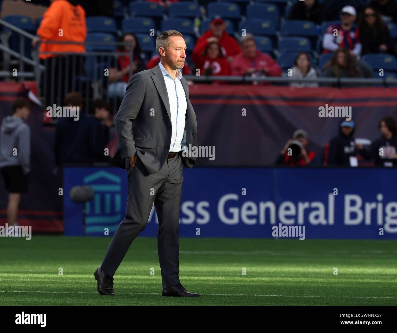 New England Revolution head coach Caleb Porter walks off the field at ...