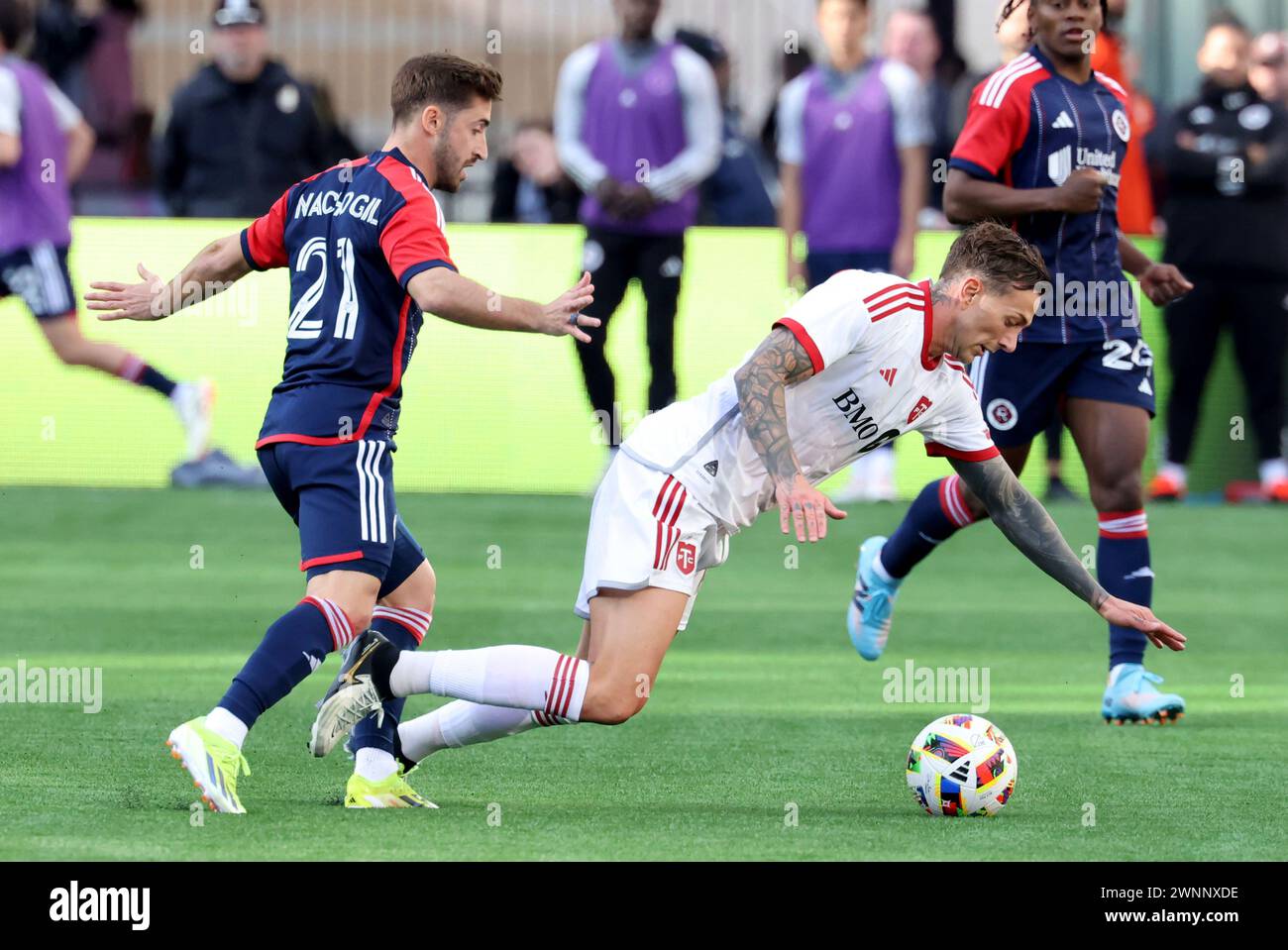 Toronto FC forward Federico Bernardeschi, right, gets tripped by new ...