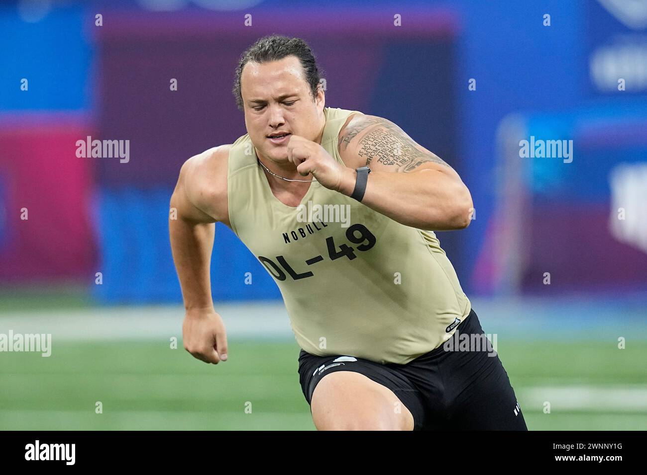 North Carolina State offensive lineman Dylan McMahon runs a drill at ...