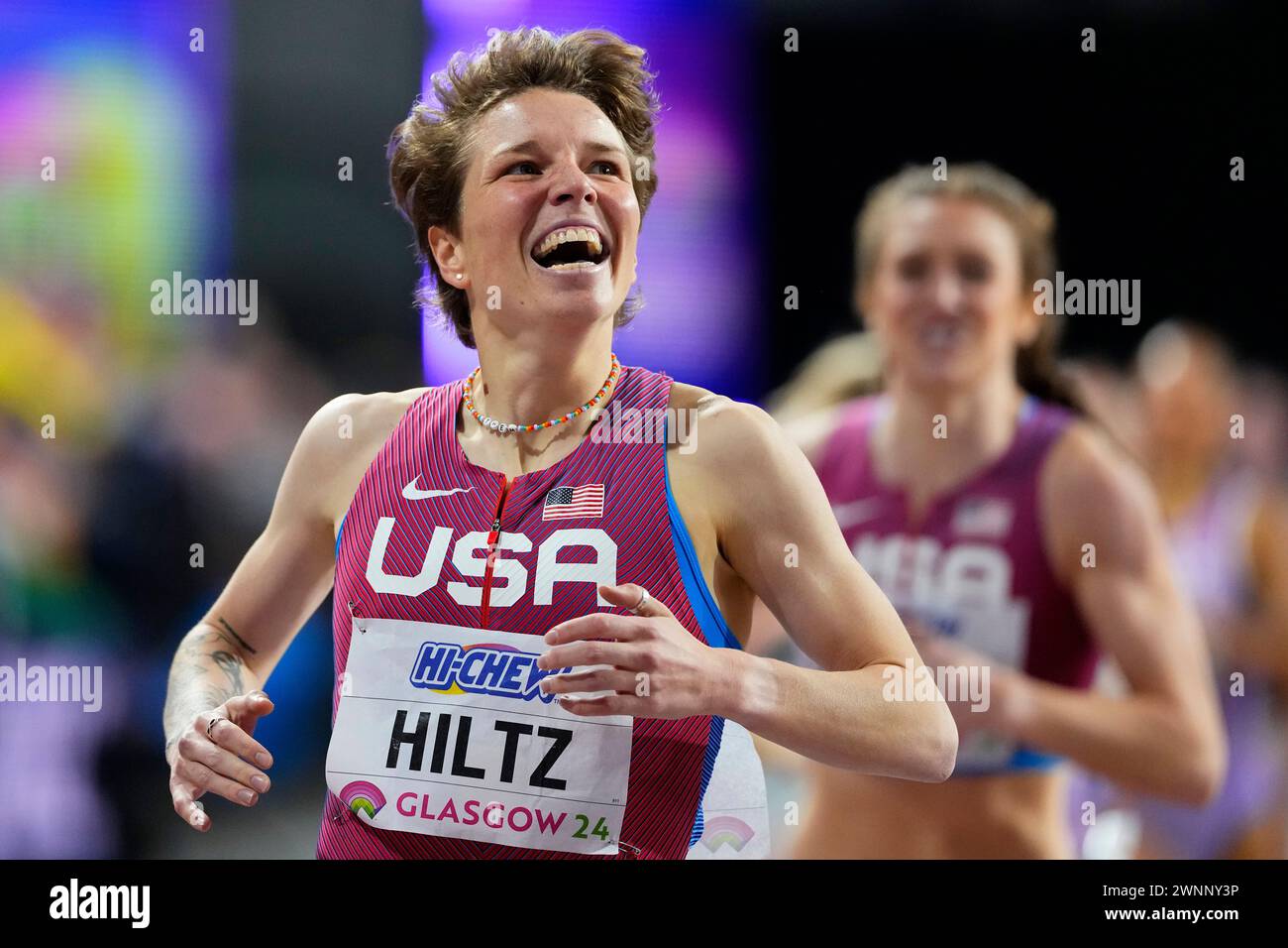 Nikki Hiltz, of the United States, reacts as she crosse the finish line ...
