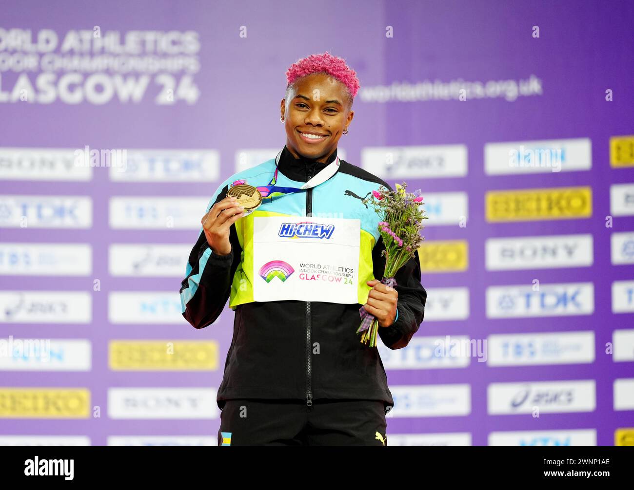 Bahamas' Devynne Charlton celebrates gold on the podium for the Women's ...