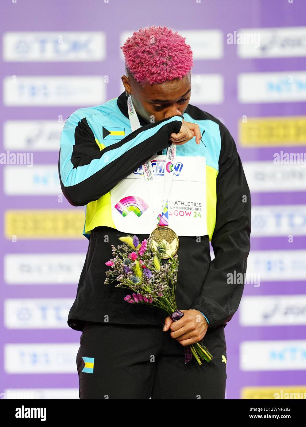 Bahamas' Devynne Charlton celebrates gold on the podium for the Women's ...