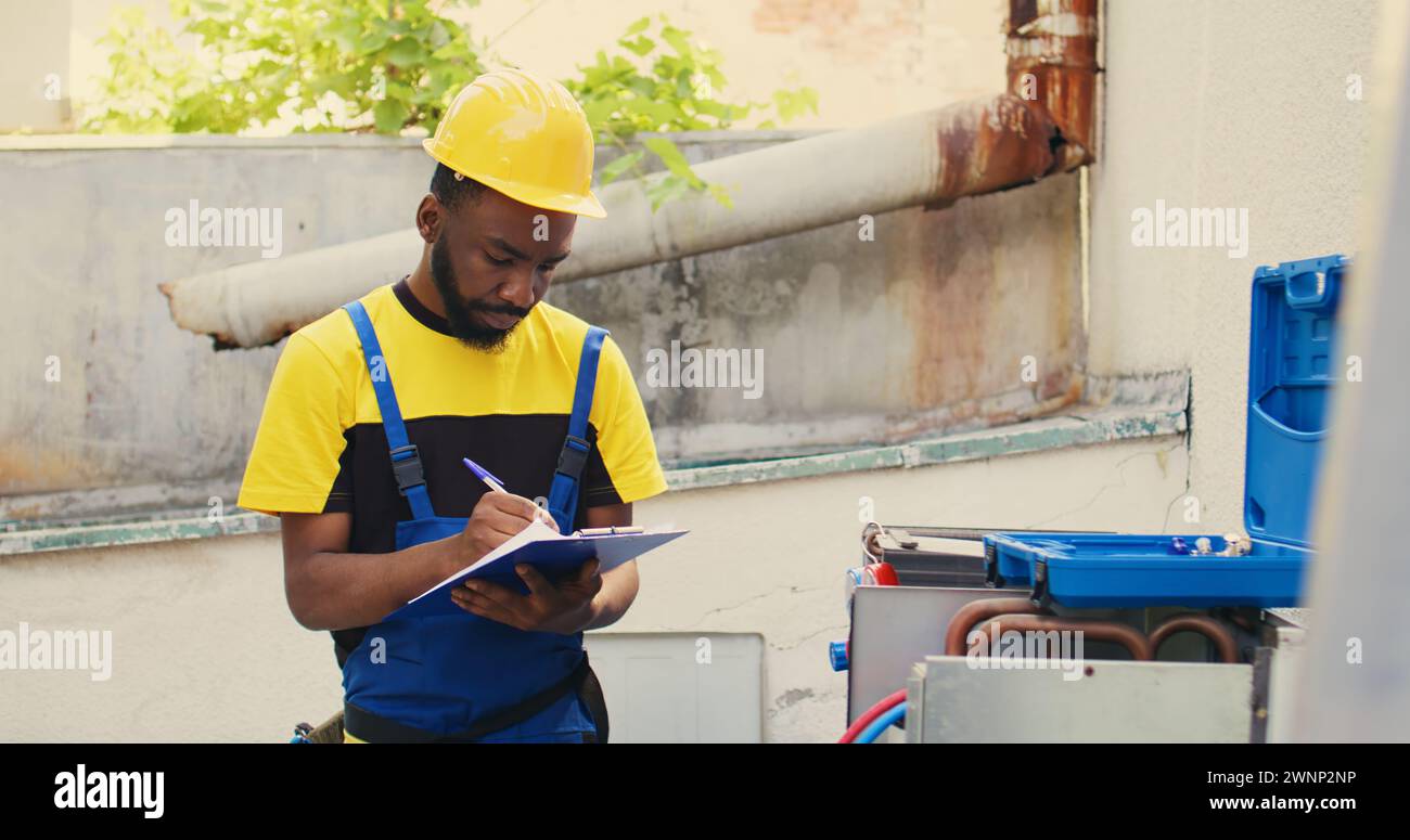 Knowleadgeable engineer doing leak checks and other necessary fixes to ... Knowleadgeable engineer doing leak checks and other necessary fixes to ...