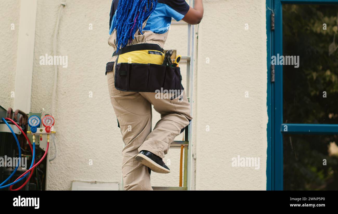 African american specialist in professional uniform with technical ...