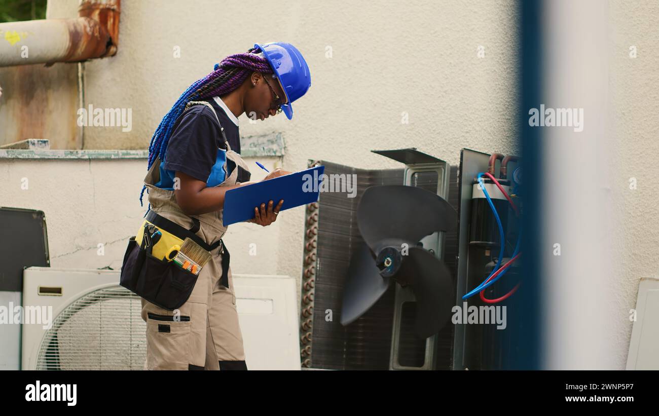 Capable electrician servicing external air conditioner internal ...