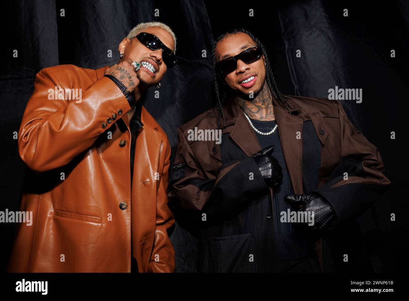 Alexander 'AE' Edwards and Tyga attend the Mugler Fall/Winter 2024-2025 ...