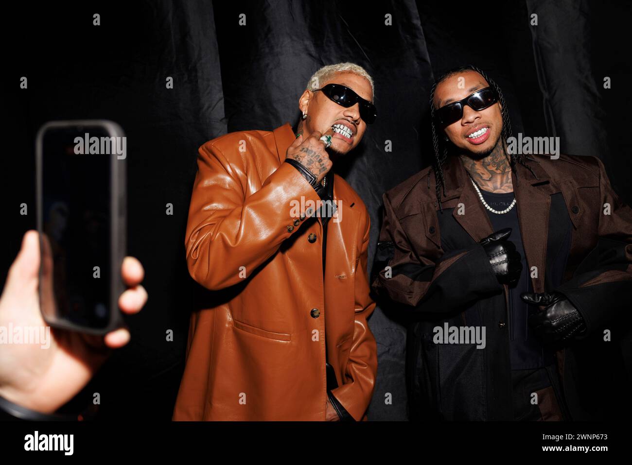 Alexander 'AE' Edwards and Tyga attend the Mugler Fall/Winter 2024-2025 ...