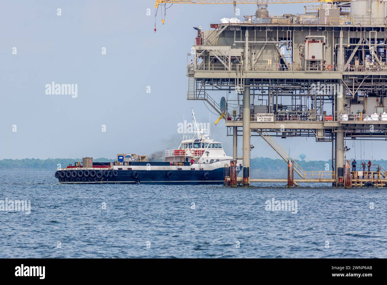 The MS Joy offshore supply ship approaching an Exxon Mobil petroleum ...