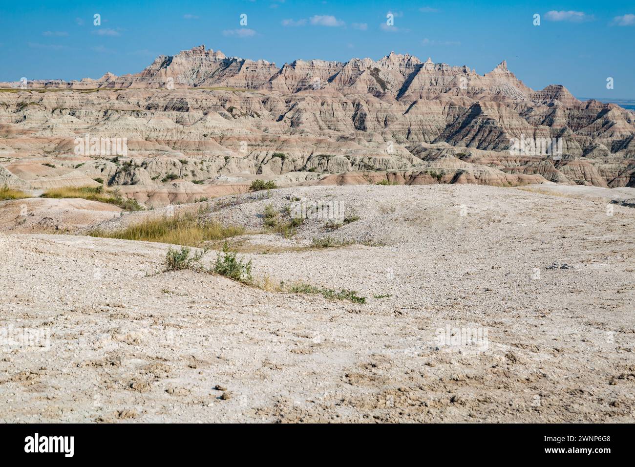 Erosion exposes colorful layers of sedimentary rock in the Badlands ...