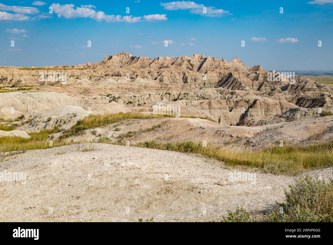 Erosion exposes colorful layers of sedimentary rock in the Badlands ...
