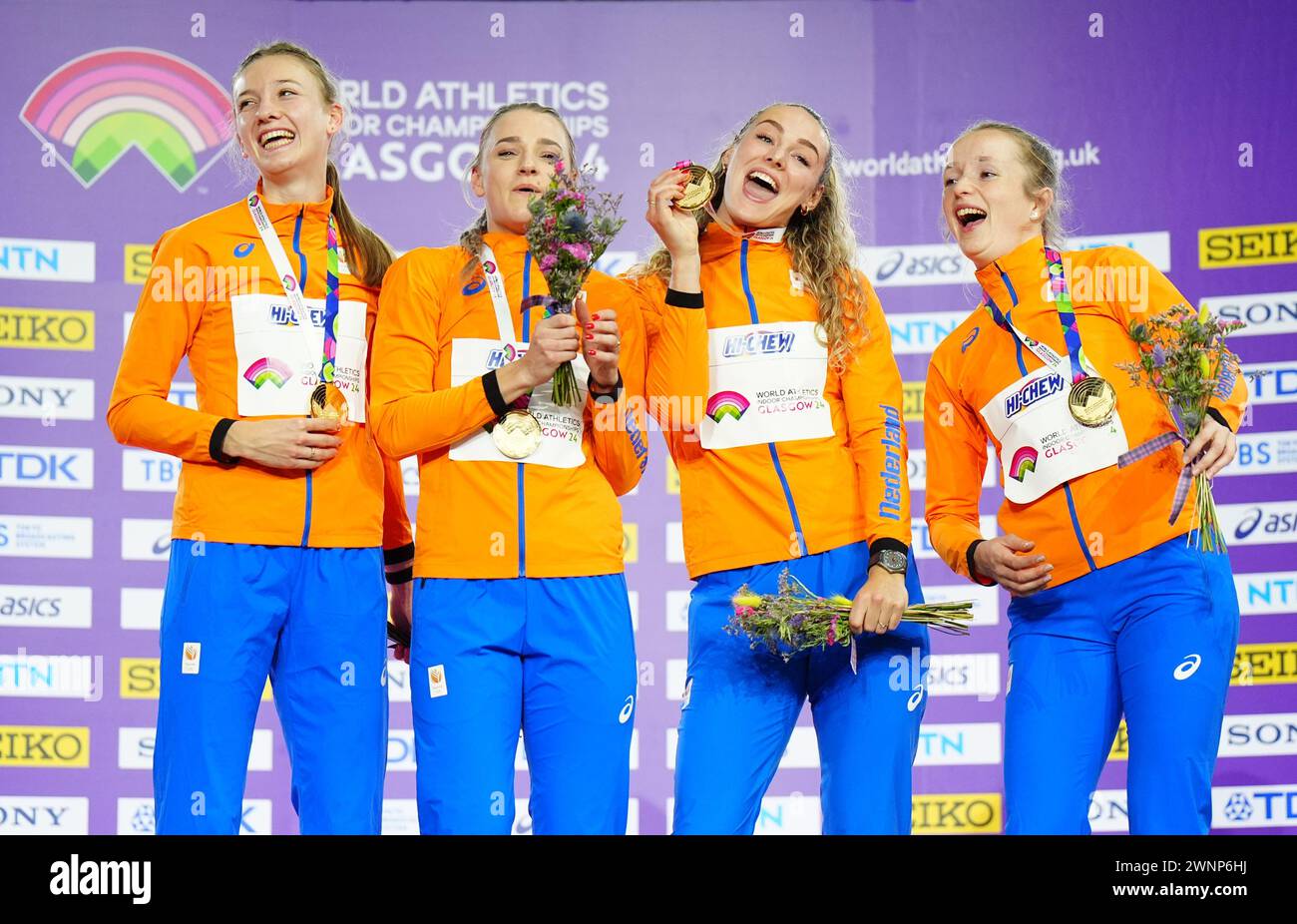 Team Netherlands celebrates gold on the podium in the Women's 4x440m ...
