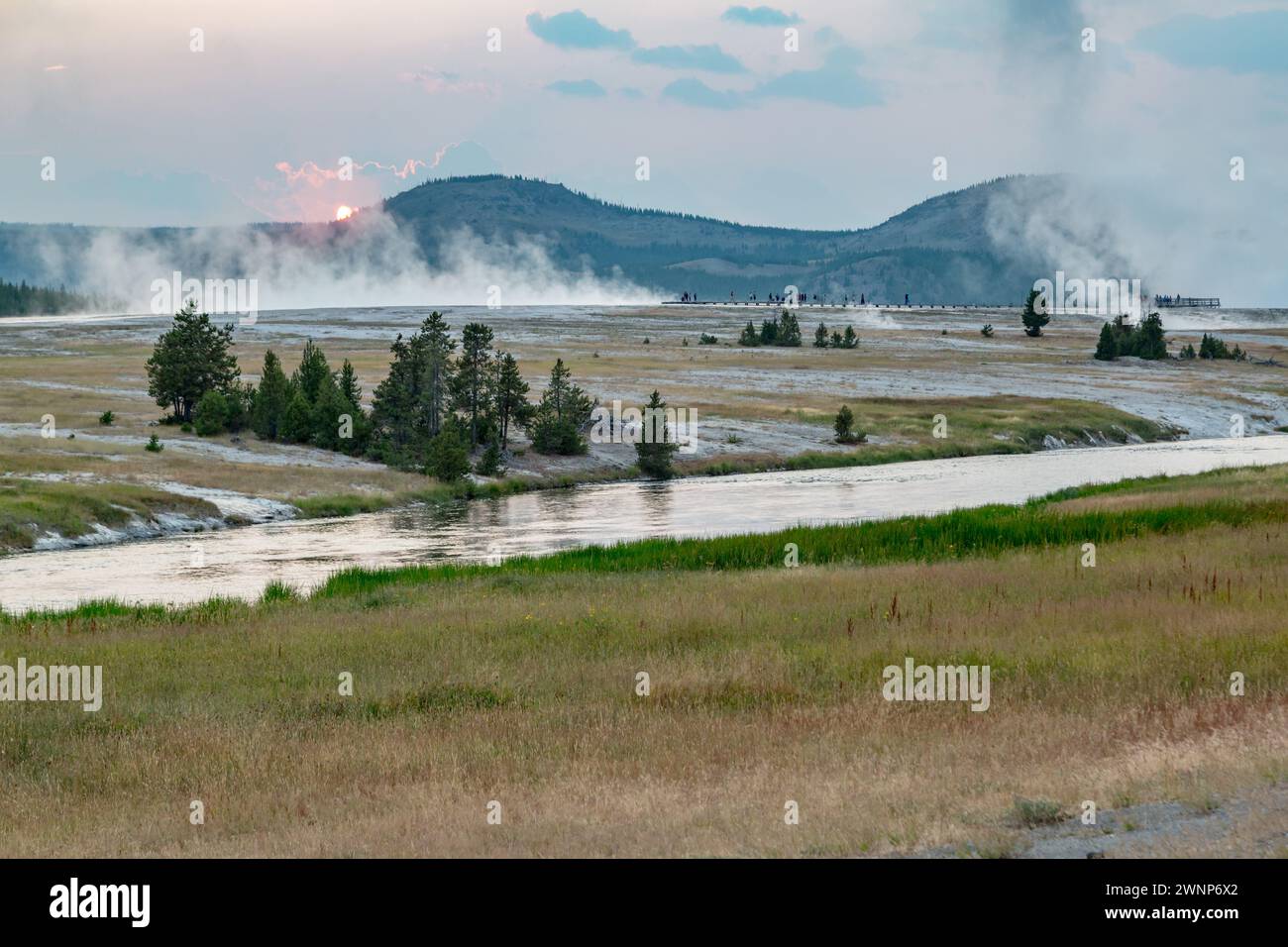 Runoff from geysers and hot springs flows into the Firehole River in ...