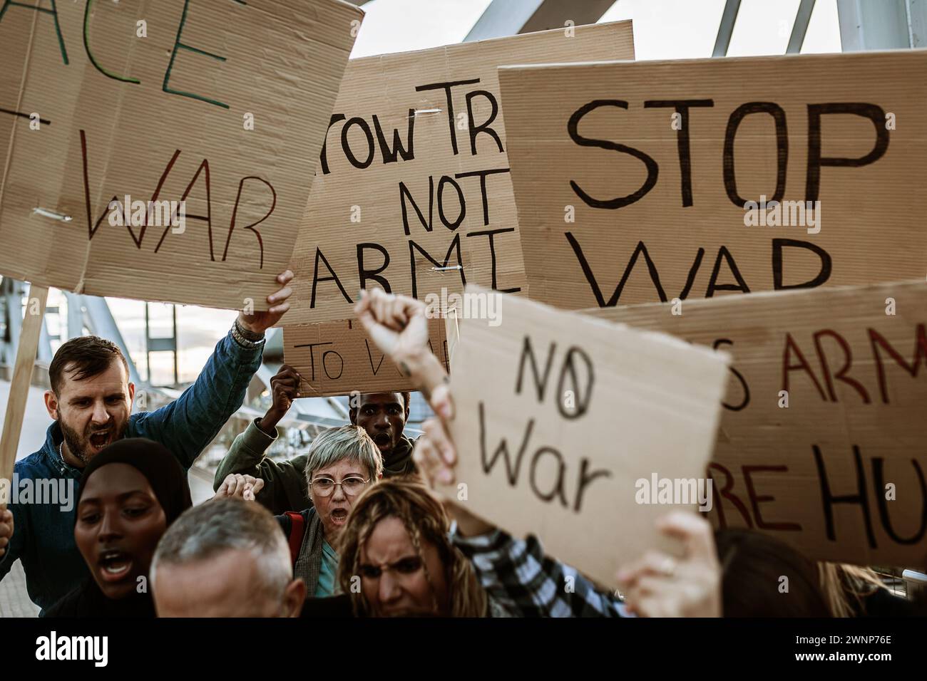 People marching with banner hi-res stock photography and images - Alamy