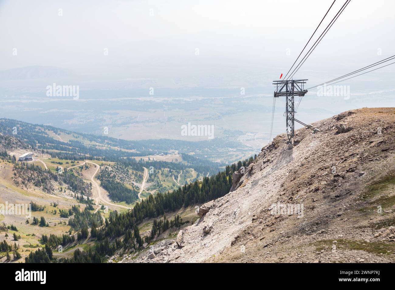 Switchback roads between ski runs on the face of the Rocky Mountains at ...