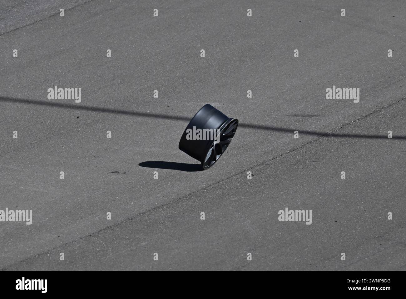 LAS VEGAS, NV - MARCH 03: A wheel comes off the car of Chris Buescher ...