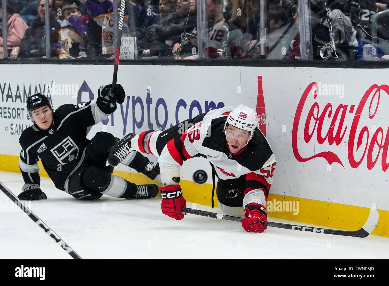 New Jersey Devils defenseman Kurtis MacDermid, right, watches after ...