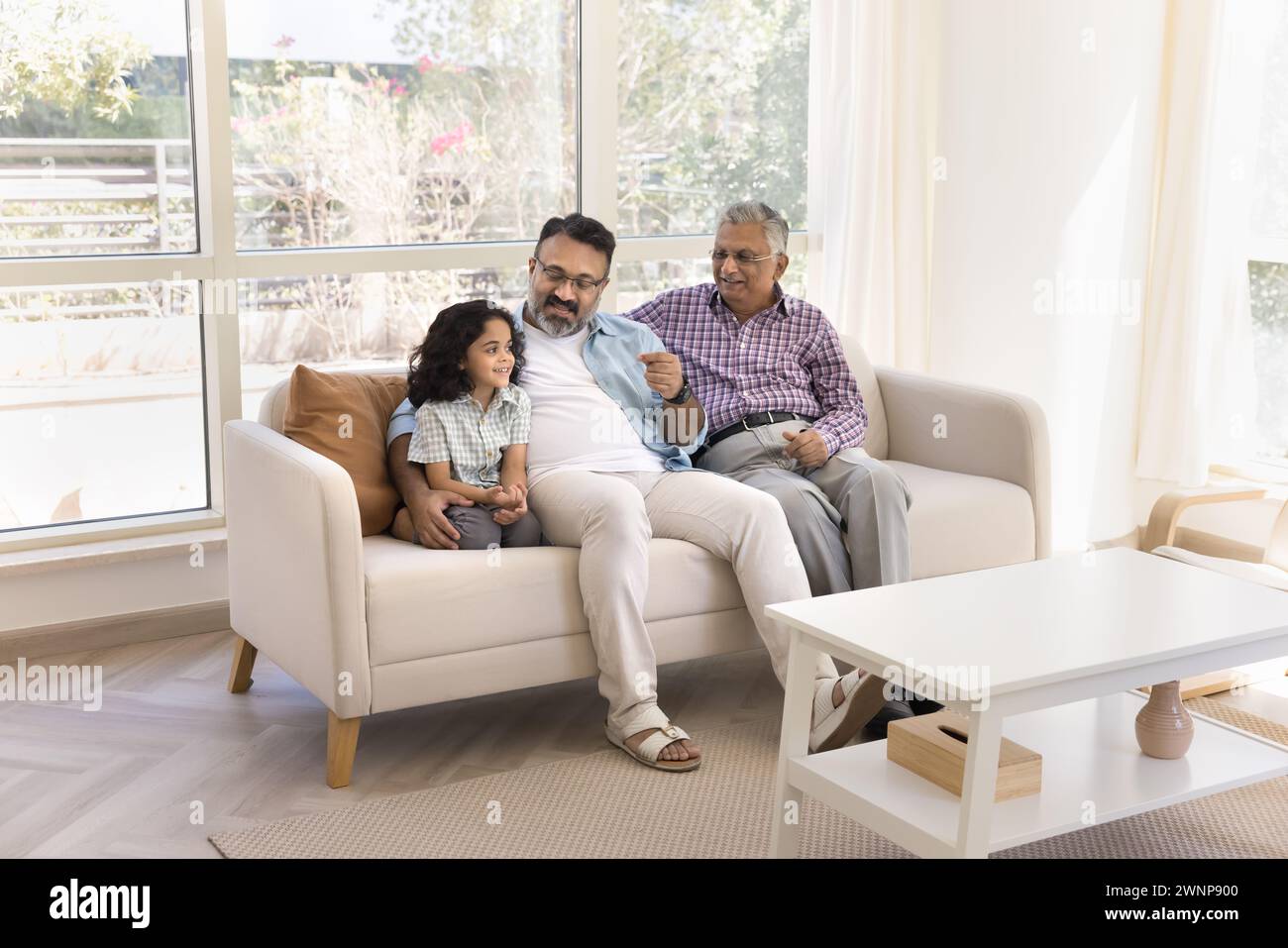 Happy Indian elderly great grandpa and great granddad watching ...