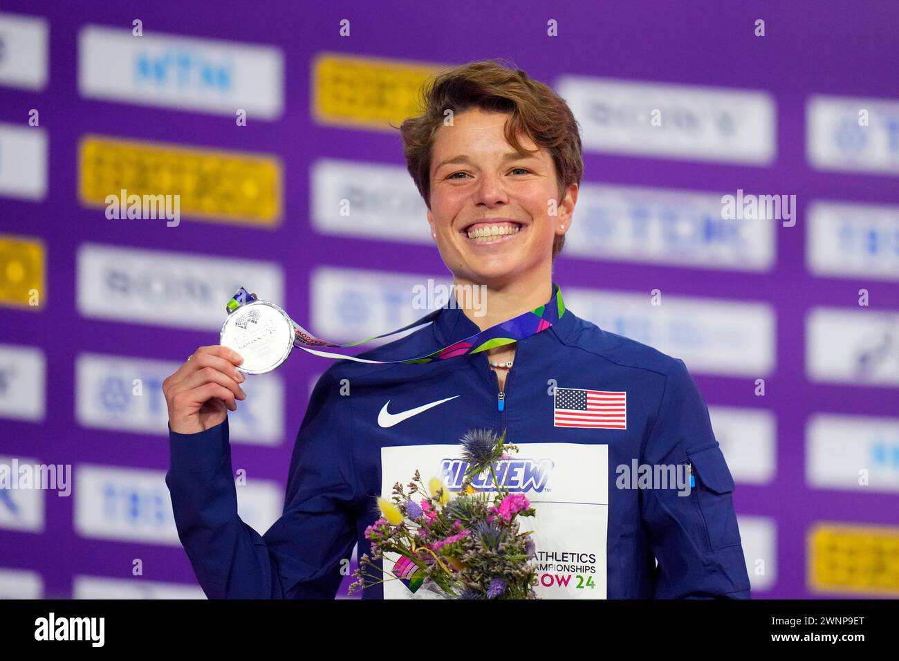 Nikki Hiltz, poses on the podium after winning the silver medal in the ...