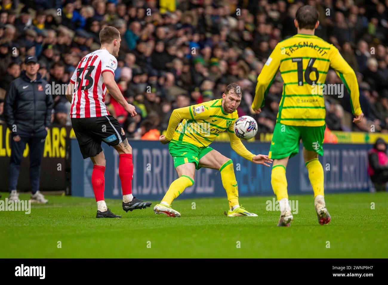 Jack Stacey of Norwich City puts Leo Hjelde of Sunderland under ...