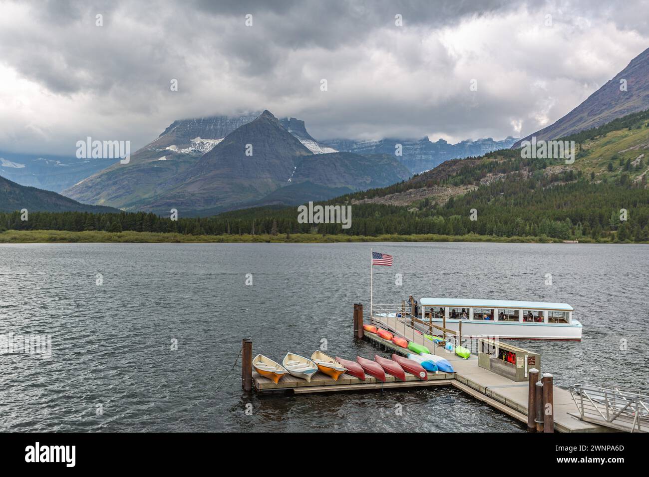 Chief Two Guns tour boat approaching the floating dock on Swiftcurrent ...