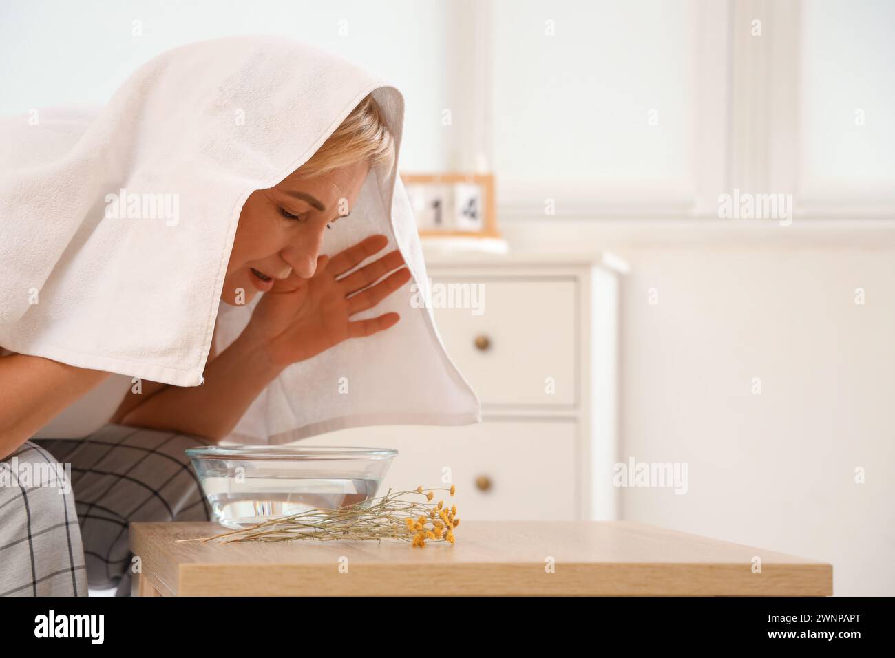 Woman doing steam therapy hi-res stock photography and images - Alamy