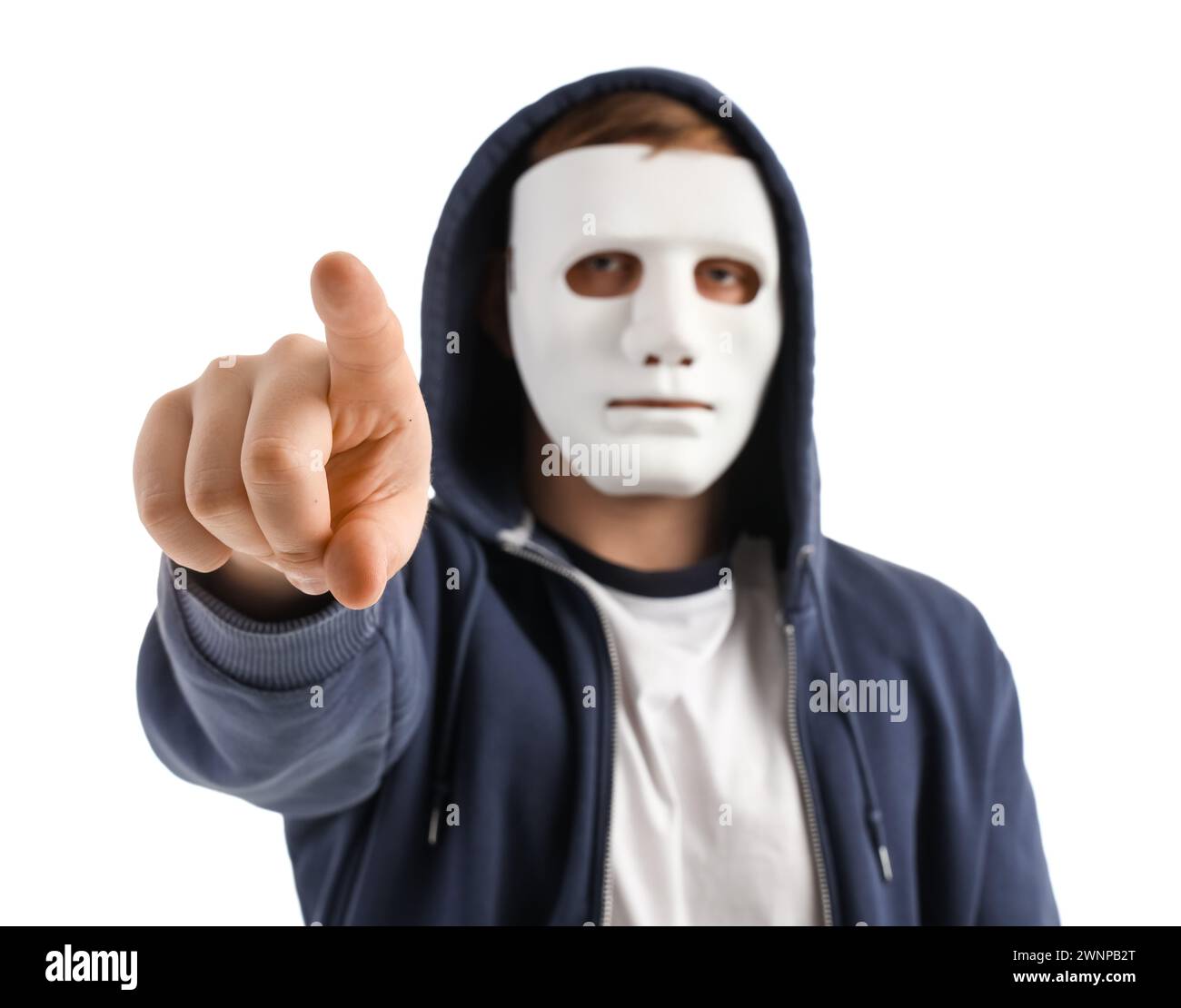 Hacker in mask pointing at viewer on white background, closeup Stock ...