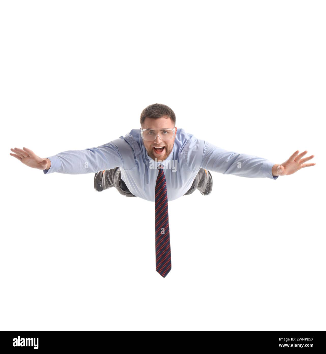 Funny businessman in safety goggles flying on white background Stock ...