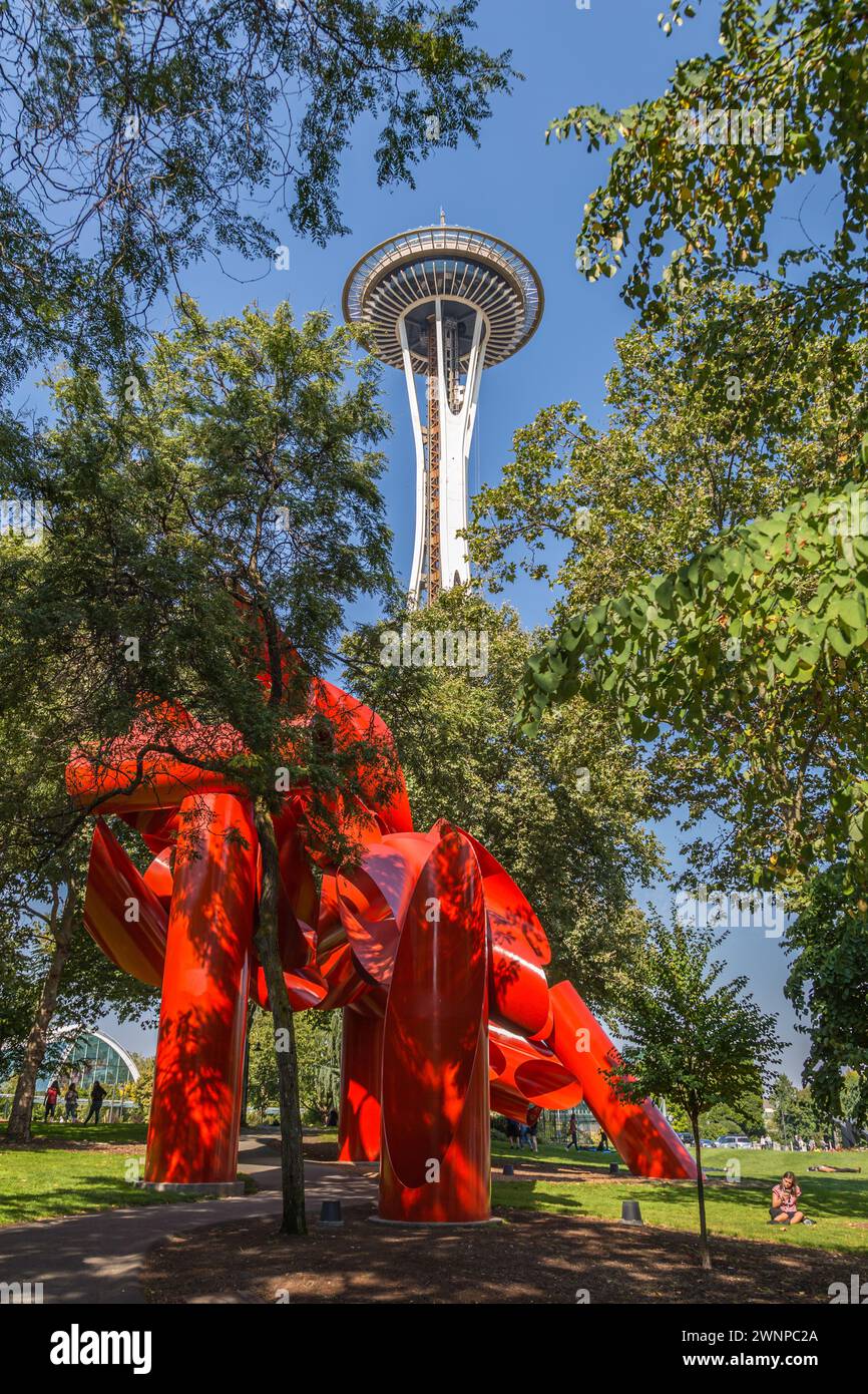 Space Needle tower and the Olympic Iliad metal sculpture in downtown ...