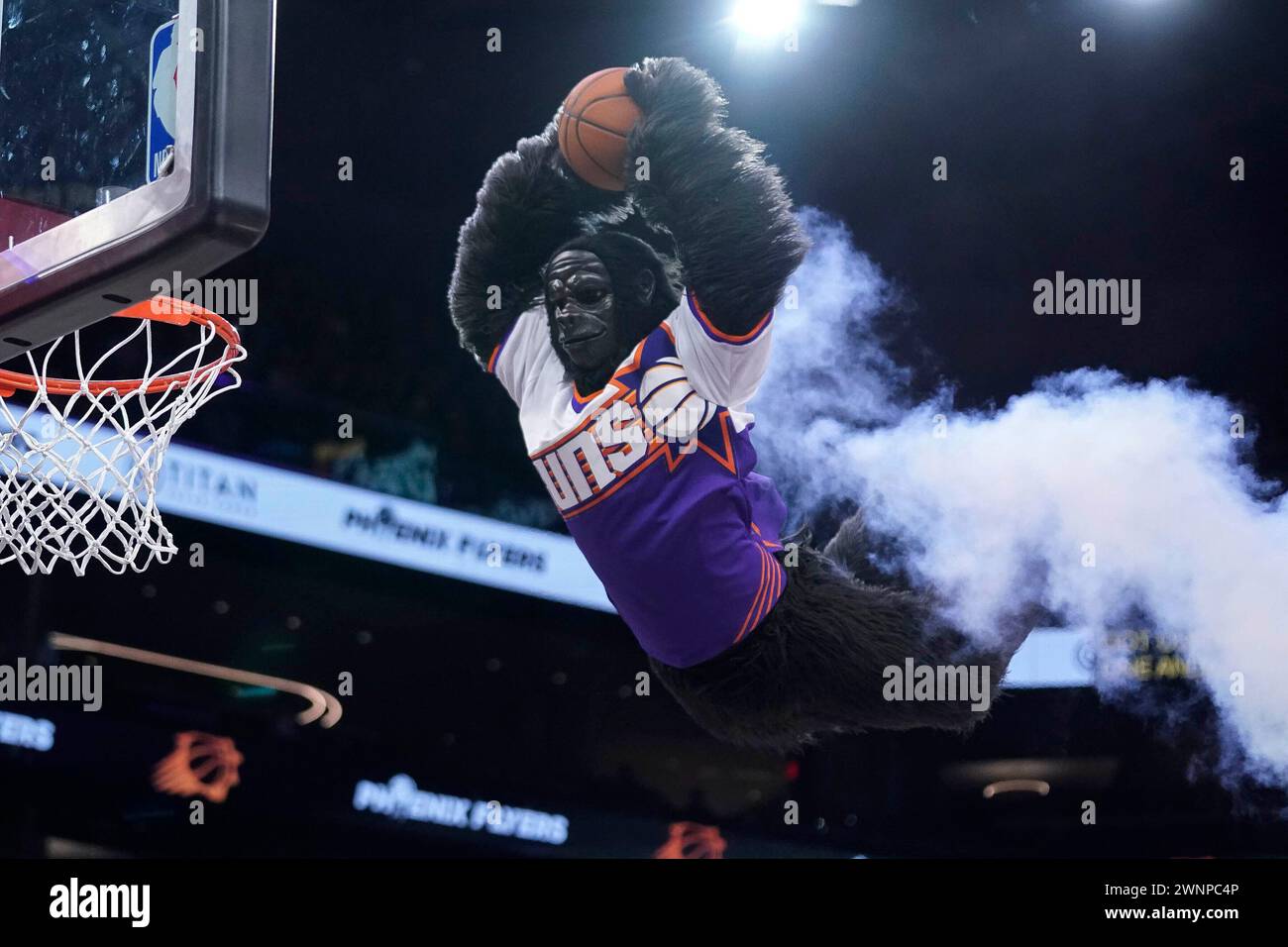 Phoenix Suns mascot The Gorilla dunks during a timeout against the ...