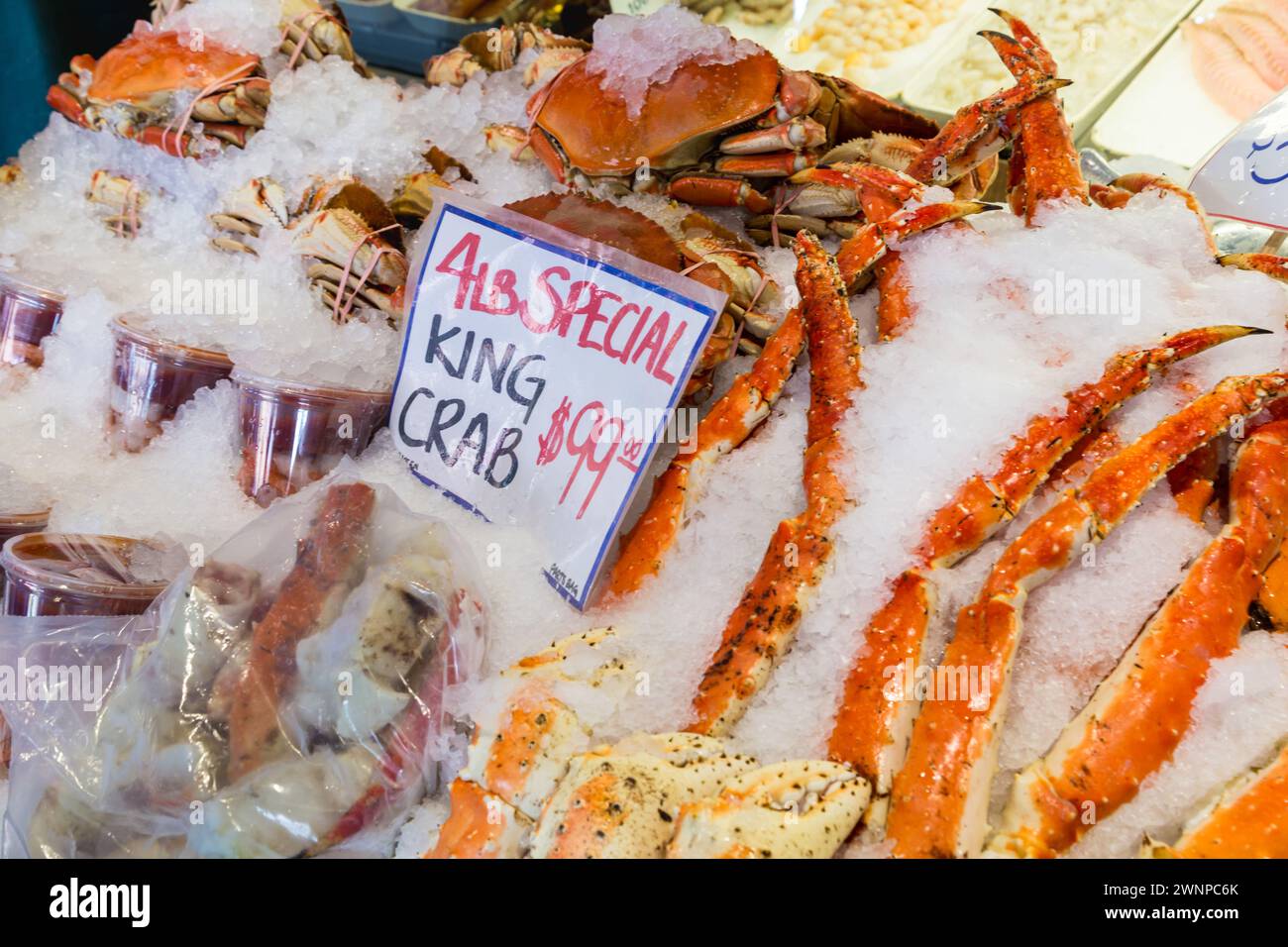 Fresh King Crab on ice for sale at the famous Pike Place Fish Market in ...