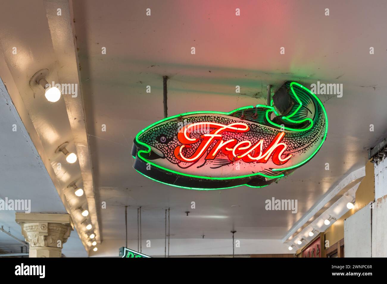 Fish shaped neon sign in the Pike Place Fish Market in downtown Seattle ...