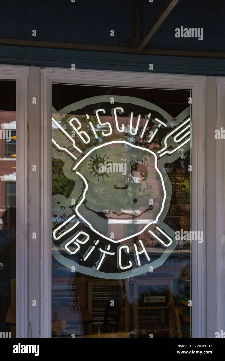 Neon sign in the window of the Biscuit Btich restaurant in downtown ...