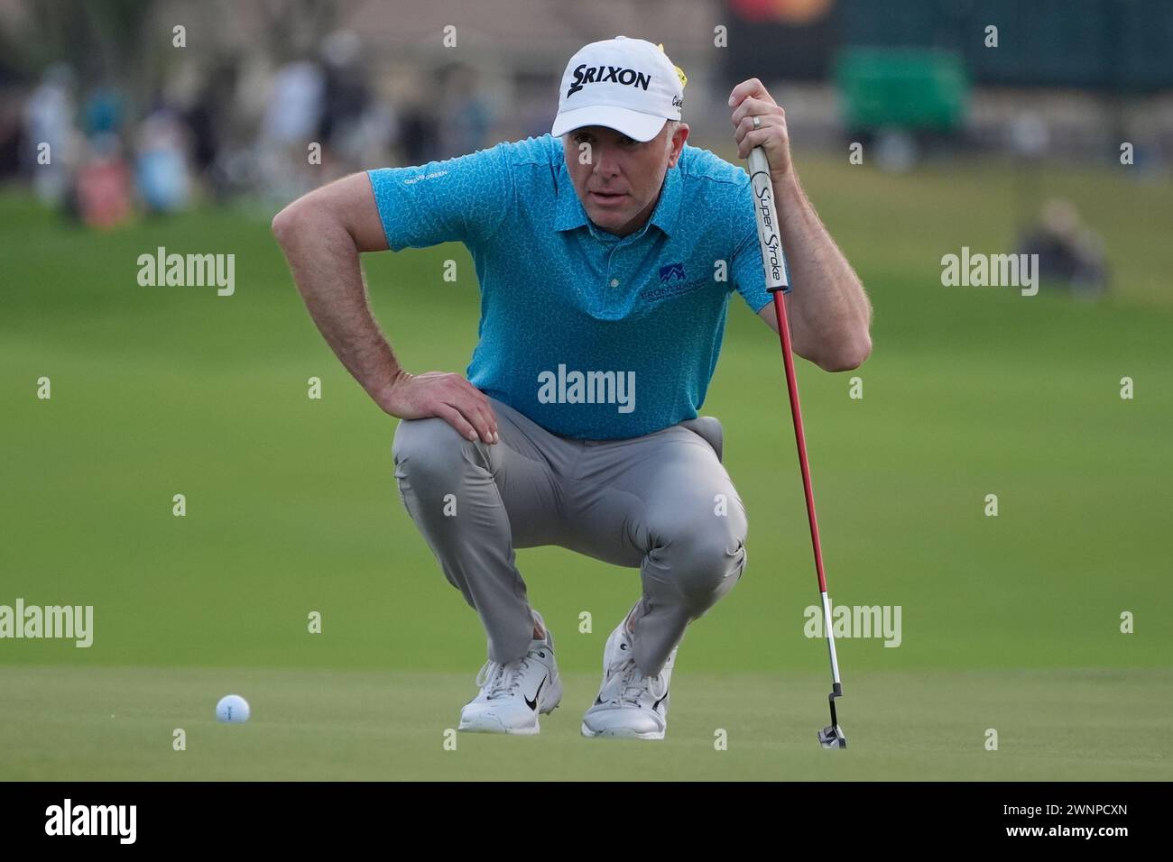 Martin Laird of Scotland looks at his shot on the sixth green during ...