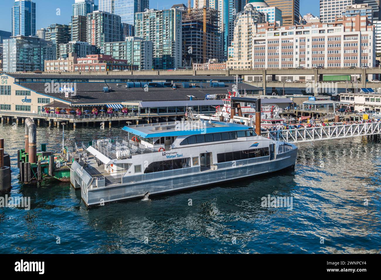 King County Water Taxi at the pier along the Elliot Bay waterfront of ...