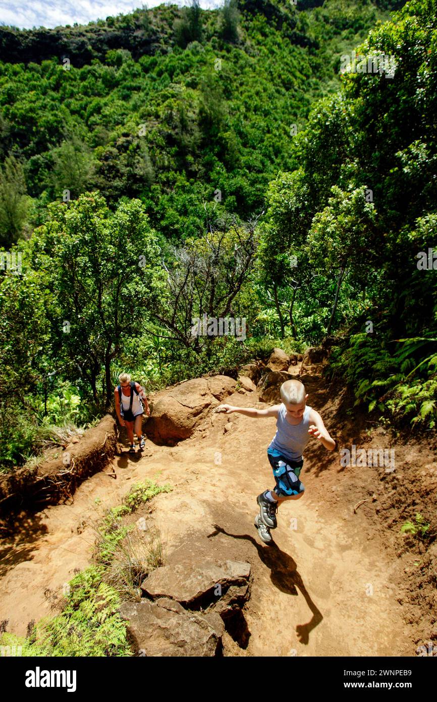 Hikers explore the Kalalau Trail, one of Hawaii's most famous hikes on ...