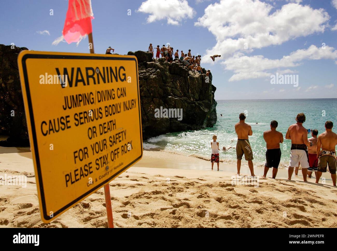 A large crop of rock provides perfect place to jump from into the water ...