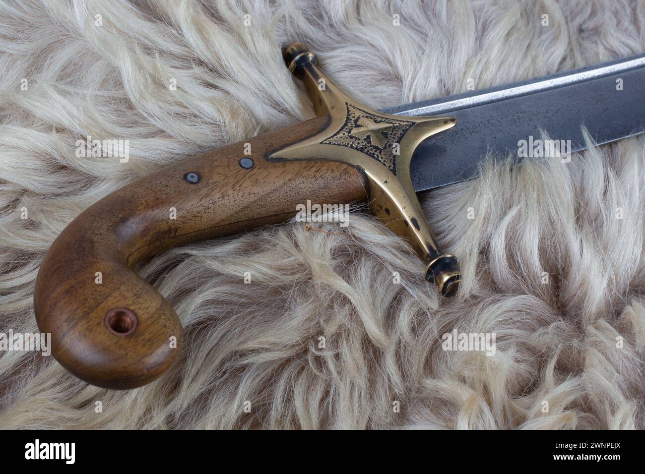 Saber Sword on fur background, 17th century. Poland, Lithuania, Hungary ...
