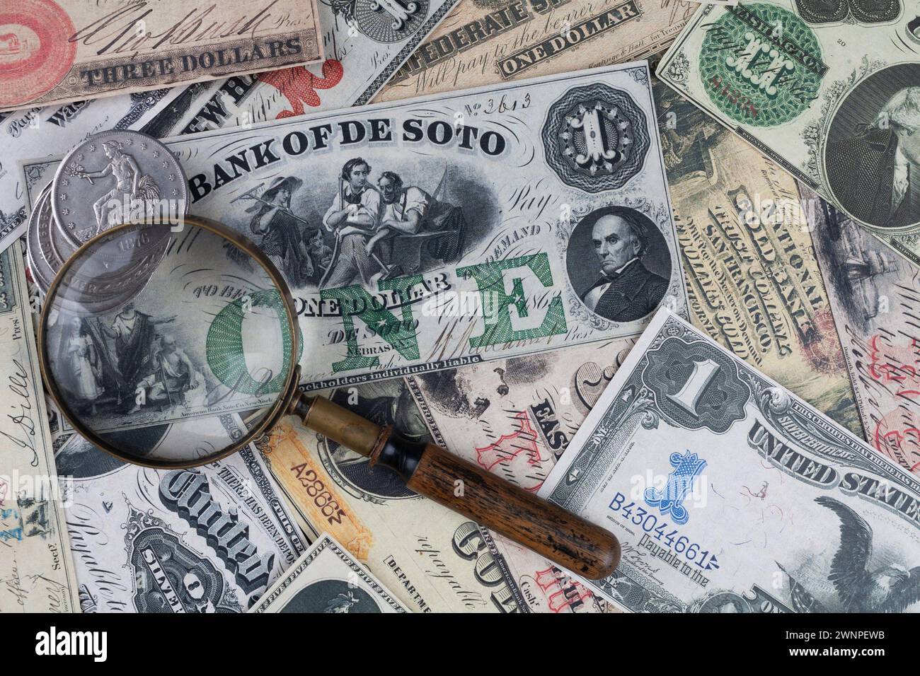 Old west period US banknotes and silver certificates with silver dollar ...