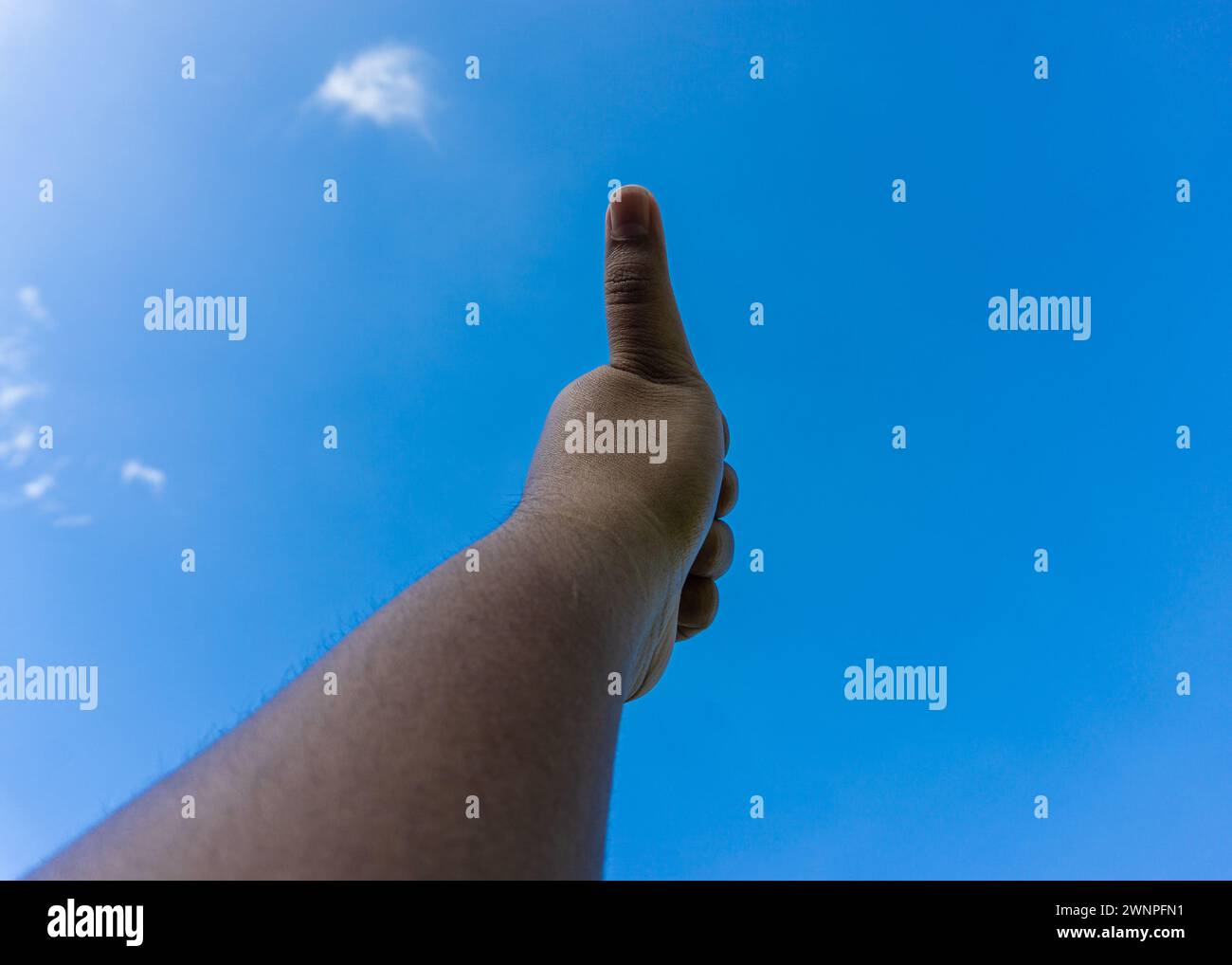 Hand with finger pointing to heaven hi-res stock photography and images ...