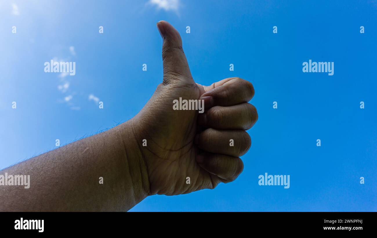 Hand with finger pointing to heaven hi-res stock photography and images ...