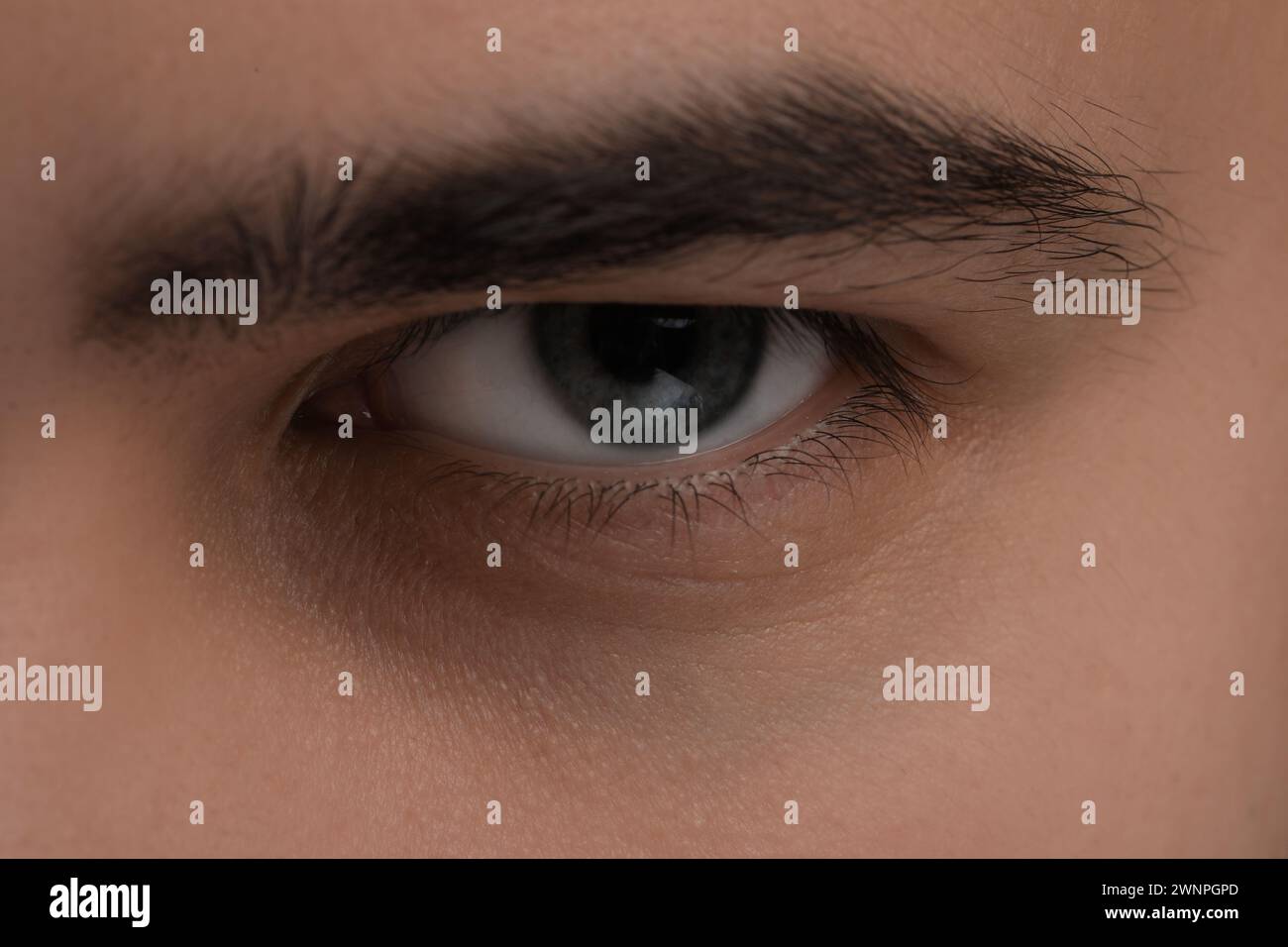 Evil eye. Man with scary eyes, closeup Stock Photo - Alamy