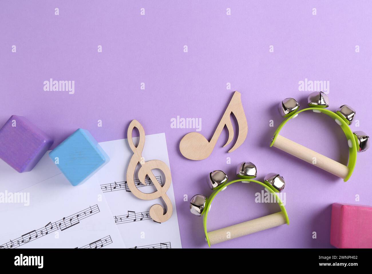 Tools for creating baby songs. Flat lay composition with wooden notes ...