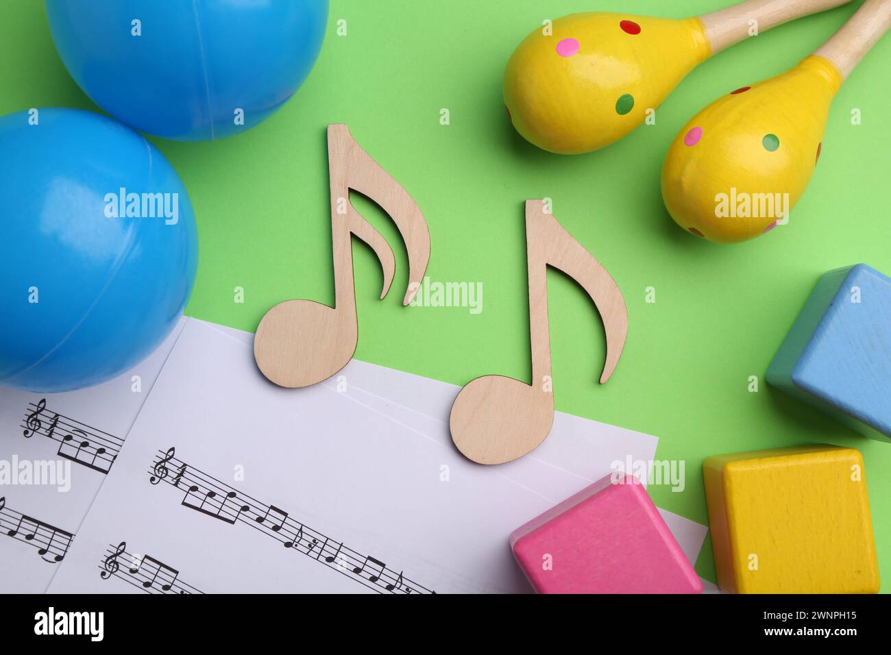 Tools for creating baby songs. Flat lay composition with wooden notes ...