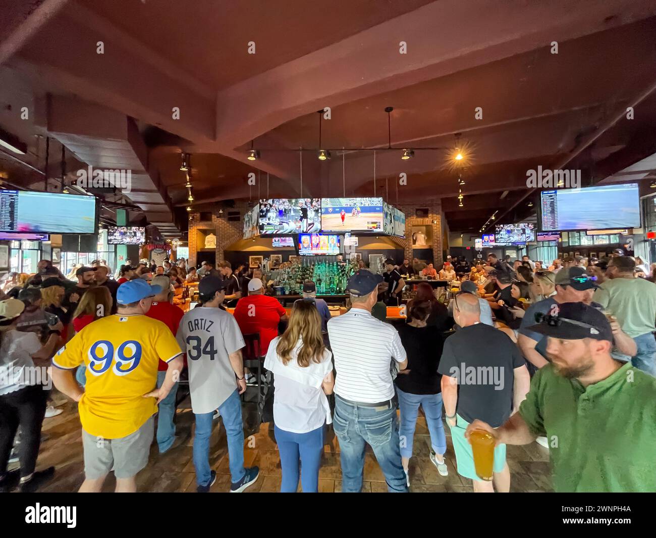 Visitors to the famour Cask N' Flagon bar and restaurant outside the ...