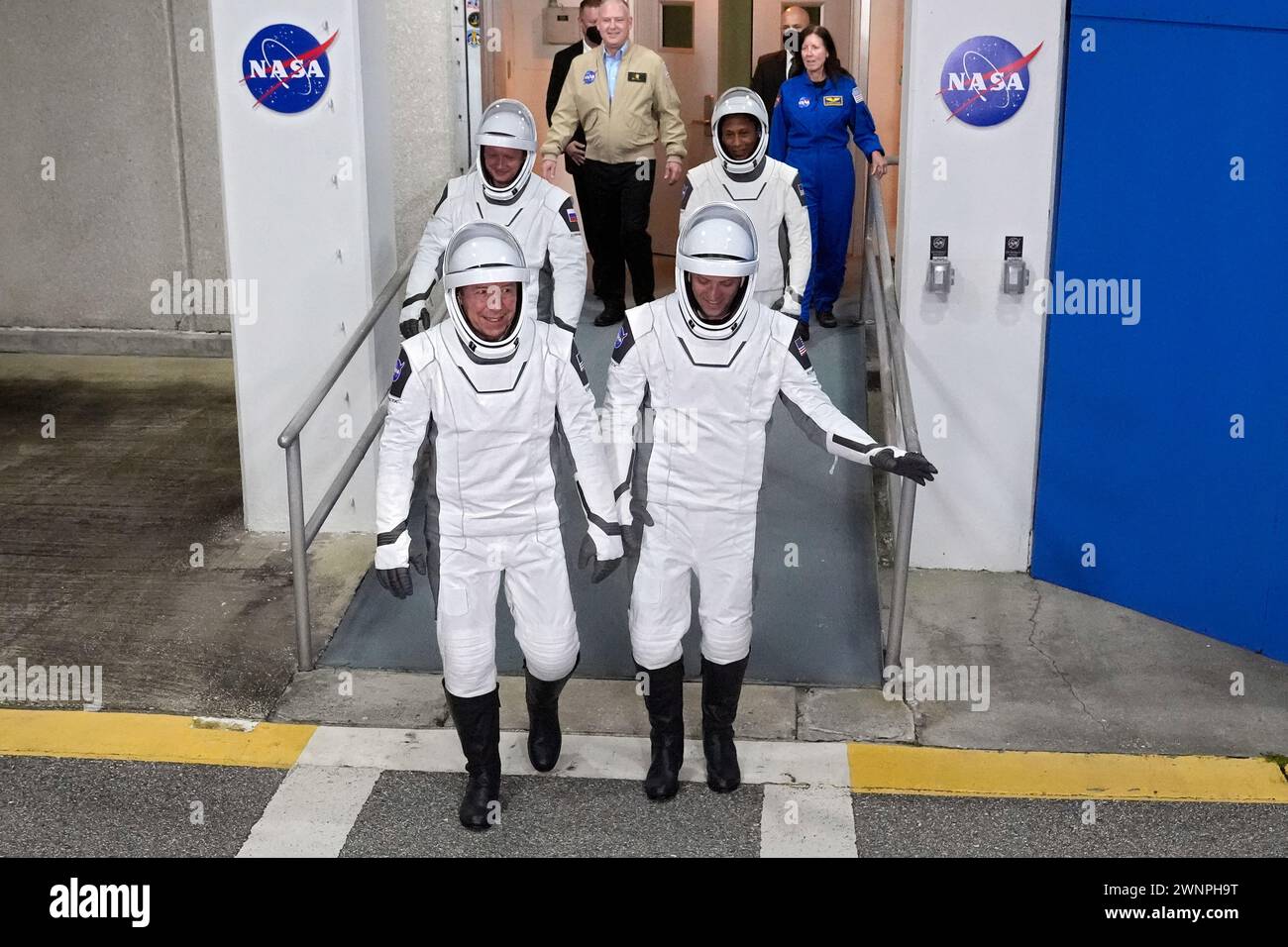 Astronauts, front row from left, pilot Michael Barratt, commander ...