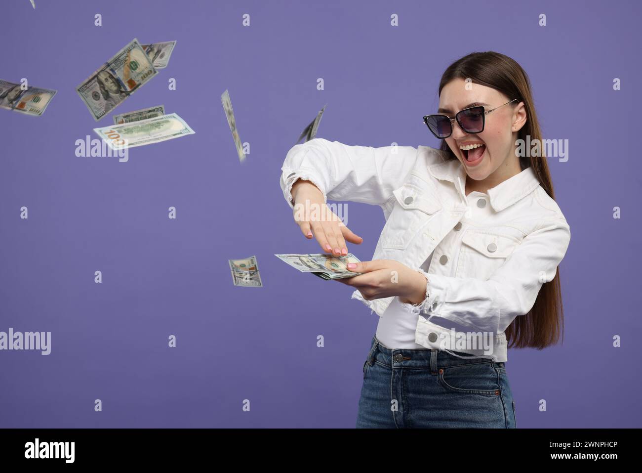 Young business throwing money concept hi-res stock photography and ...