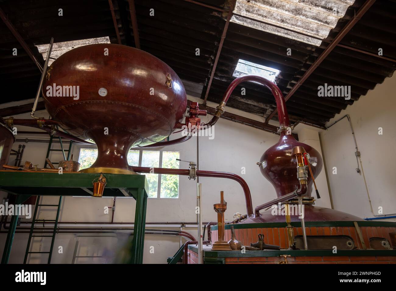 Double distillation process of cognac spirit in Charentias copper still ...