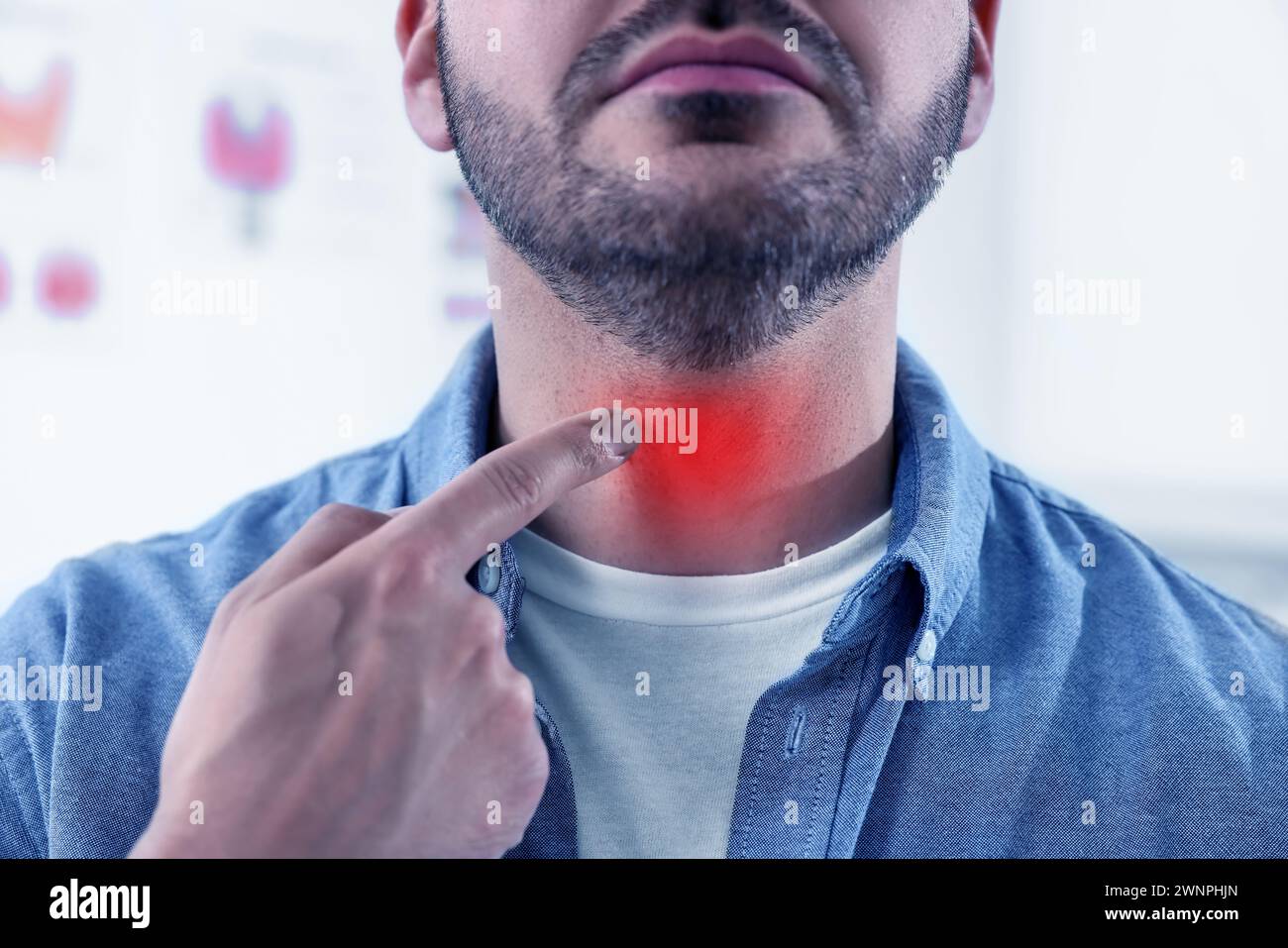 Endocrine system. Man doing thyroid self examination indoors, closeup ...